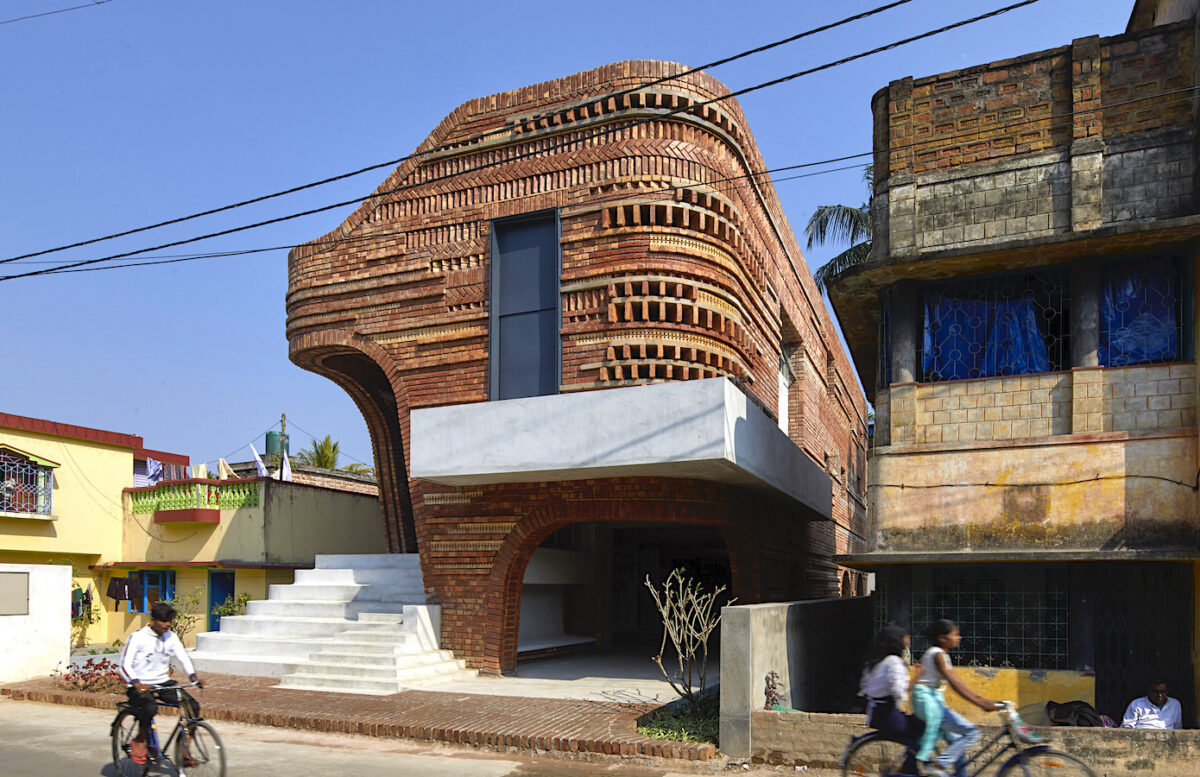 A new community centre in West Bengal is covered in intricate brickwork ...