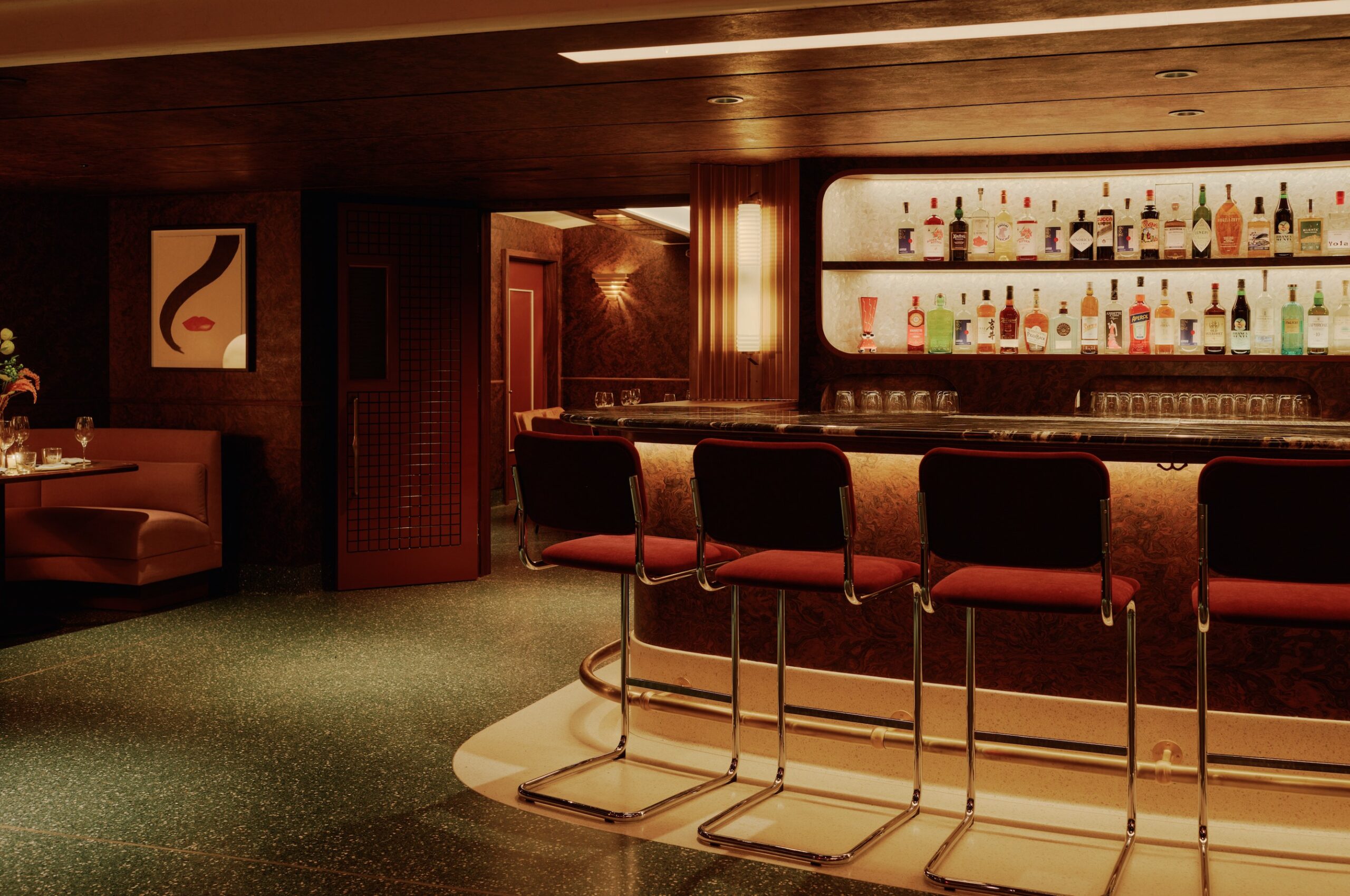 Parts and Labor Design adds walnut wood panels and Italian red stone to ...